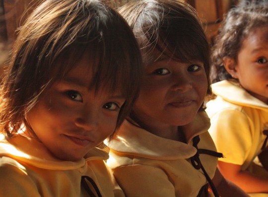 Early childcare for young girls in Cebu City slums, Philippines